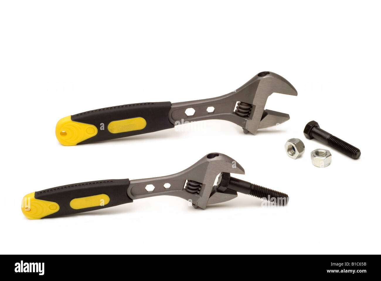 two spanners with nuts and bolts Stock Photo - Alamy