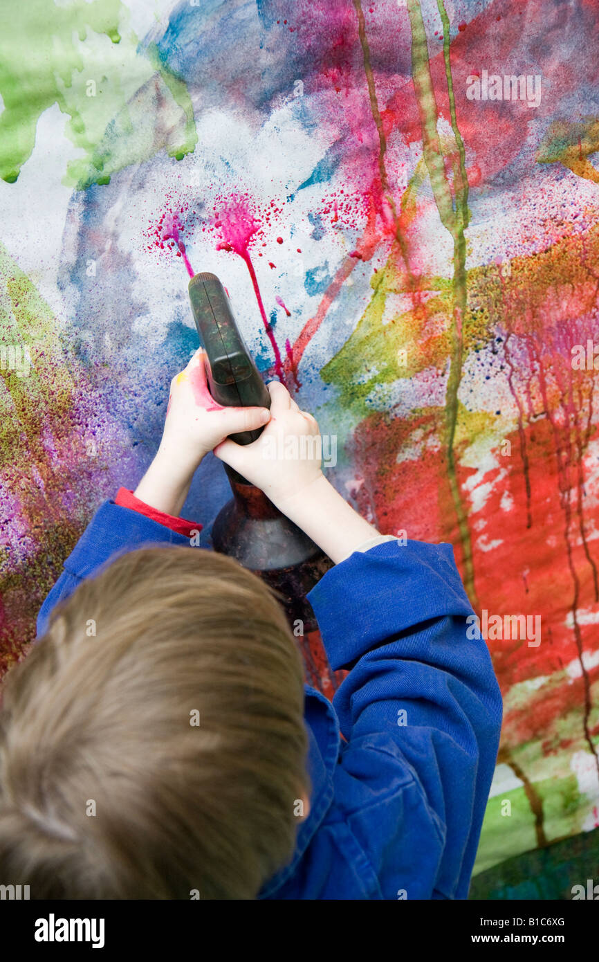 little bpy painting picture in studio Stock Photo - Alamy