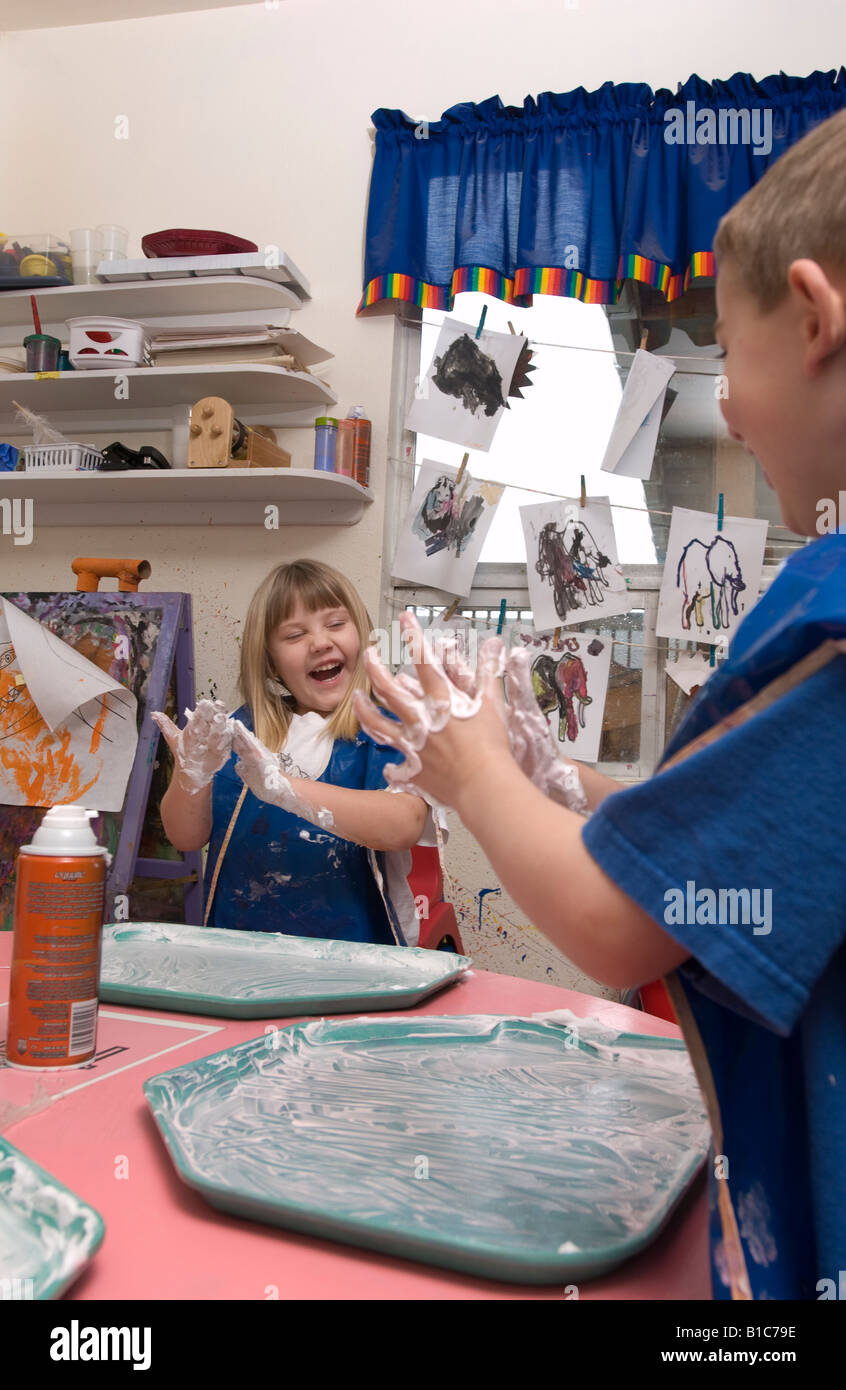 Preschool kids playing with shaving cream Stock Photo - Alamy