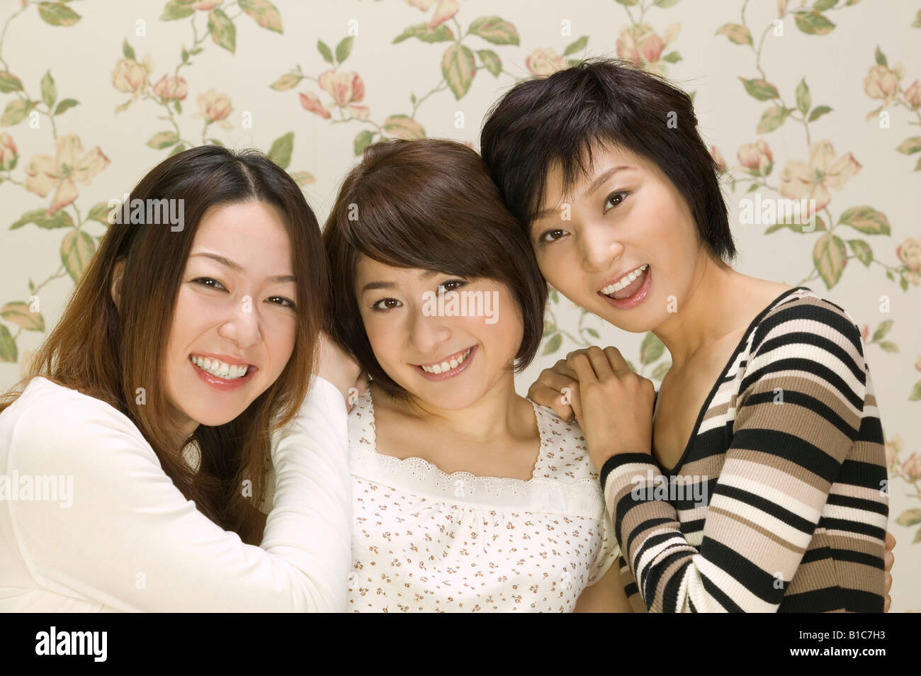 Portrait of three young women Stock Photo - Alamy