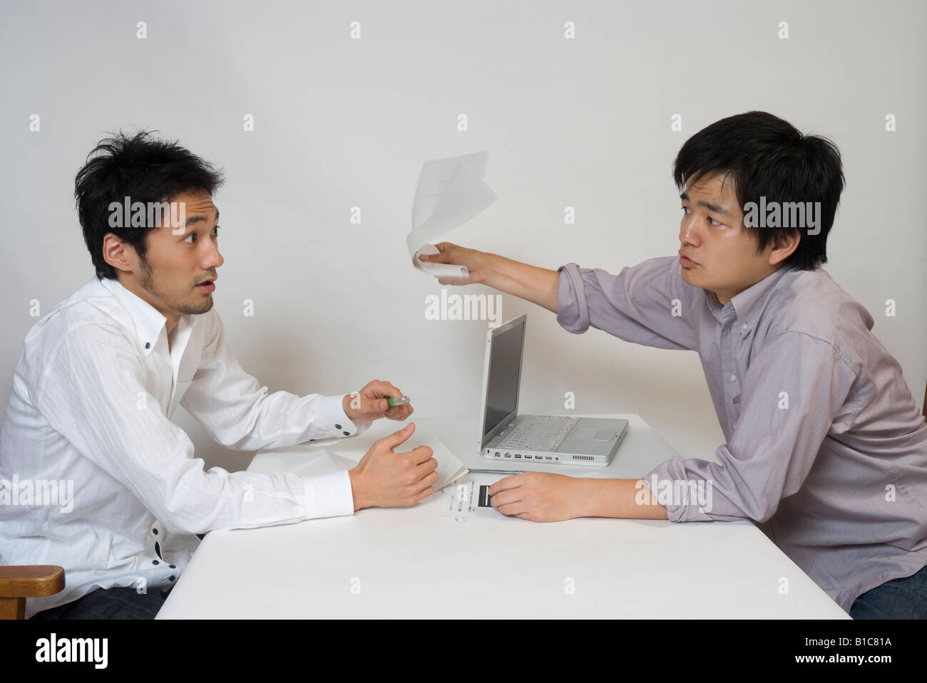 Two young men arguing Stock Photo - Alamy
