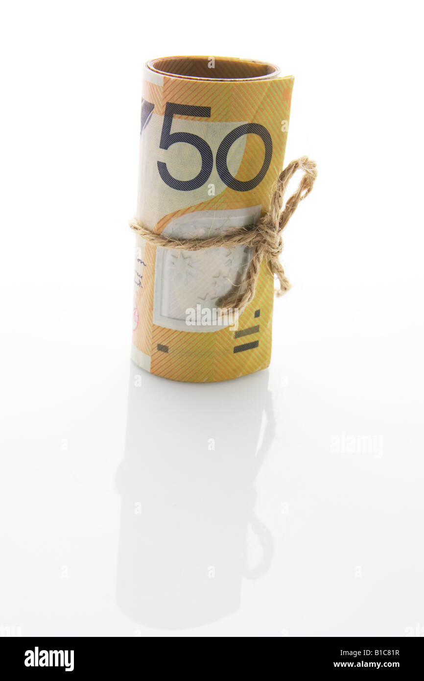 Roll of Dollar Notes Tied with String Stock Photo - Alamy