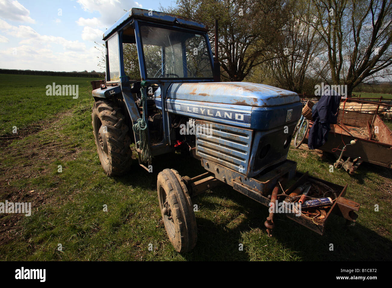 Old British Leyland Tractor and trailer on a farm in Steeple Bumpstead ...