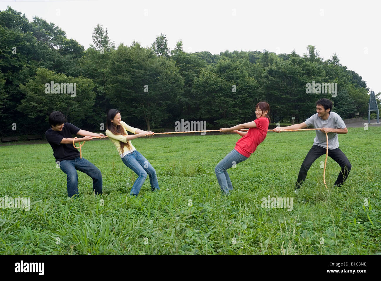 Young japanese woman pulling rope hi-res stock photography and images ...