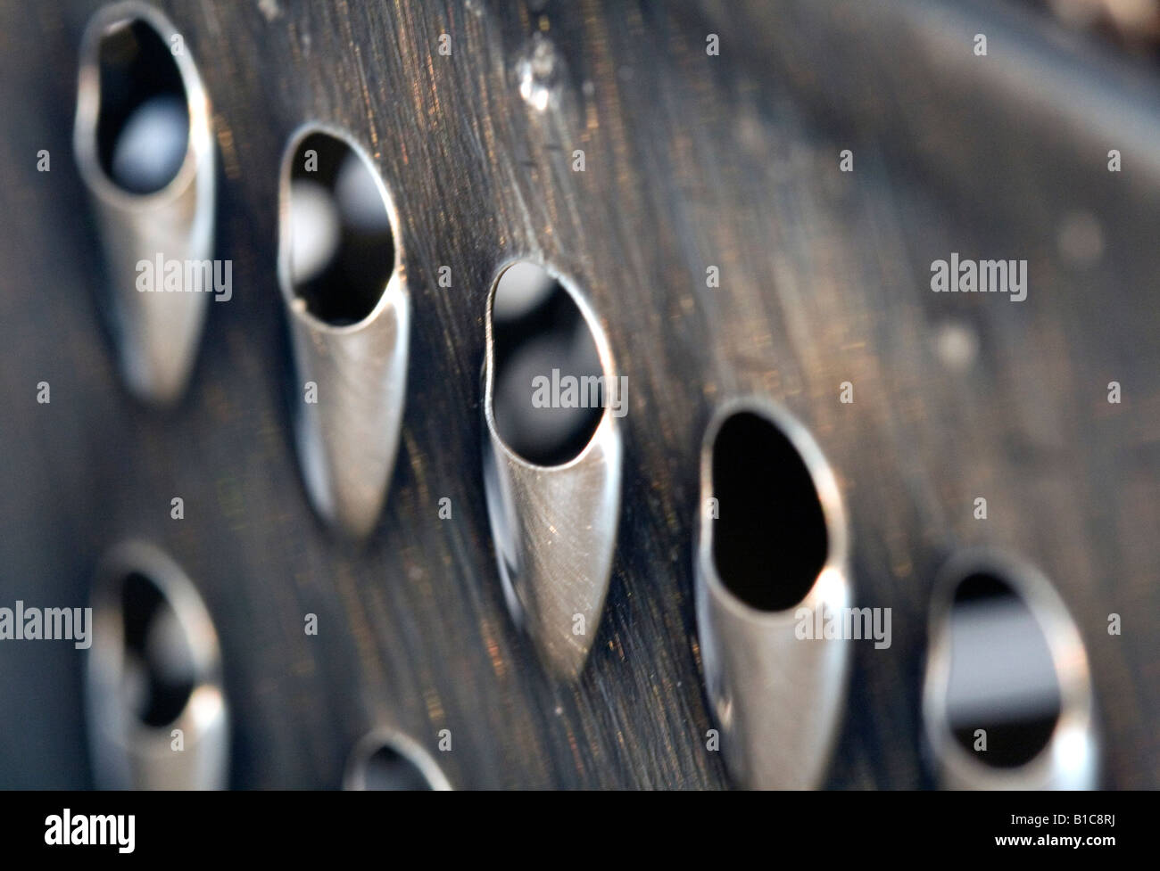 Cheese grater close up Stock Photo - Alamy