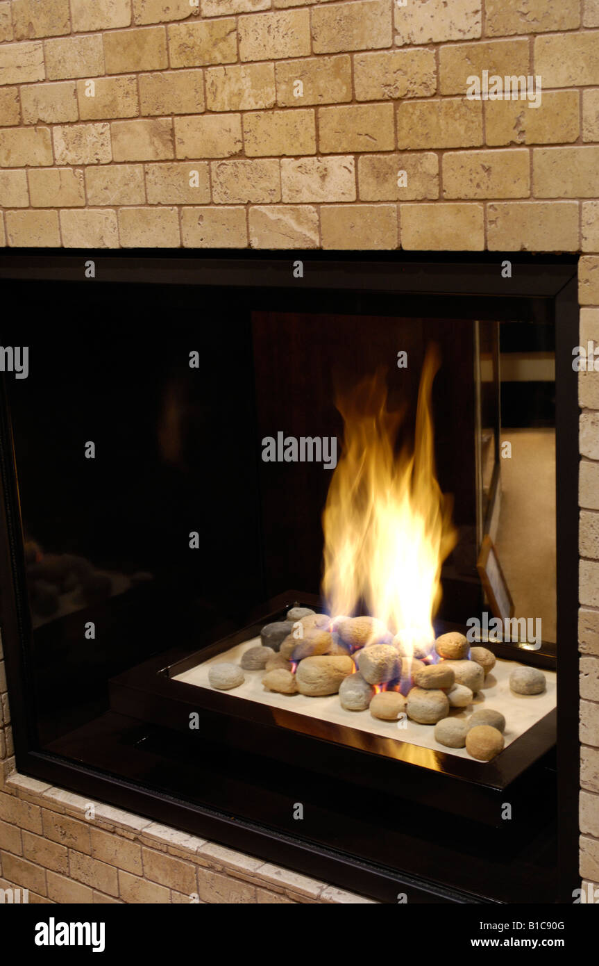 Contemporary natural gas fireplace Stock Photo - Alamy