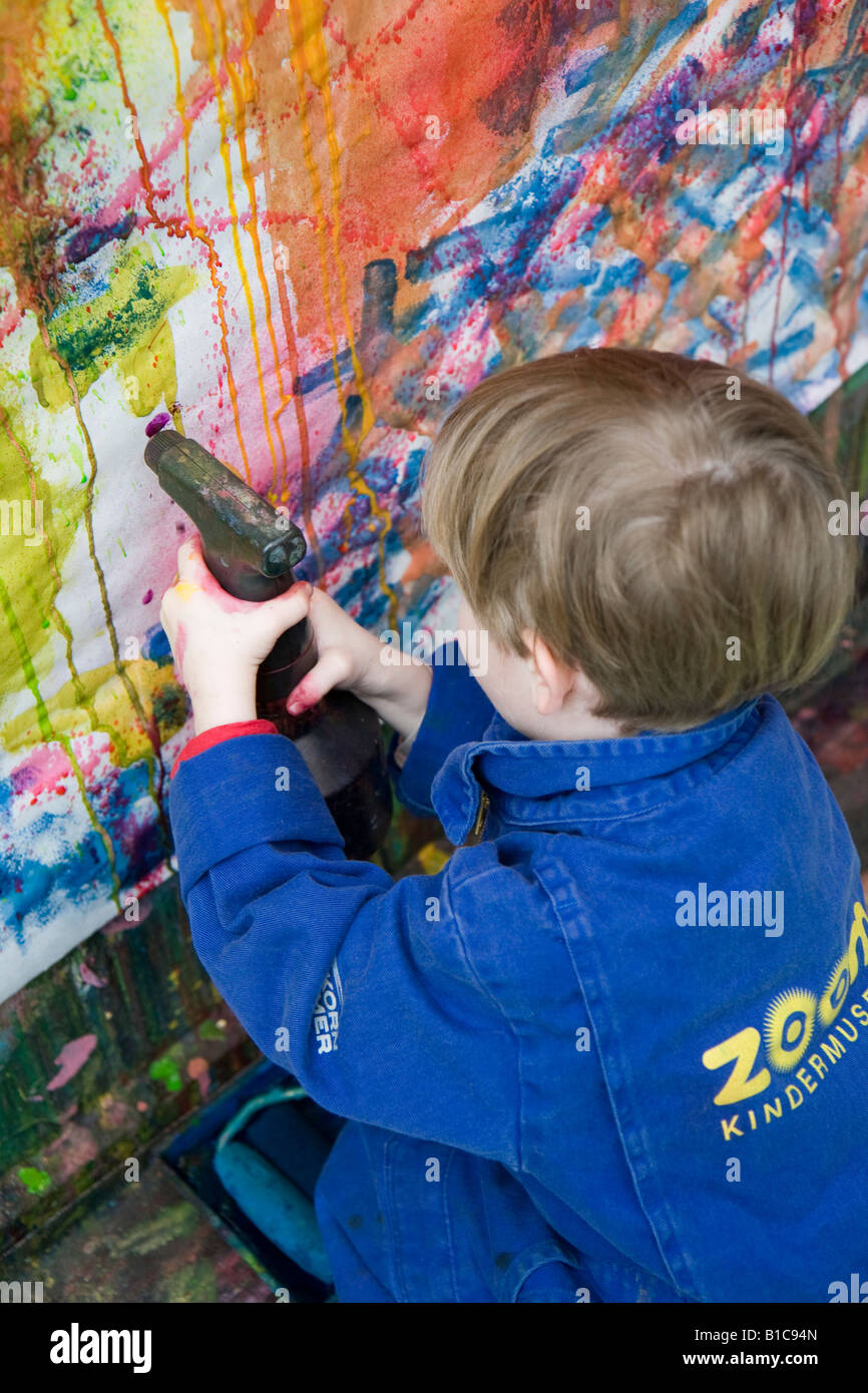 little bpy painting picture in studio Stock Photo - Alamy
