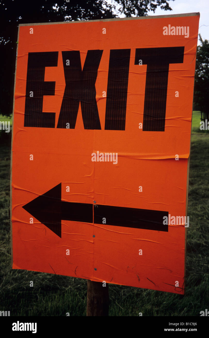Bright Orange Exit Sign Stock Photo - Alamy