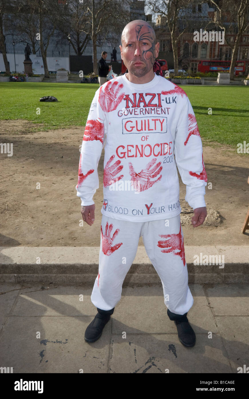 The Ant, a peace demonstrator in Parliament Square. His suit has bloody ...