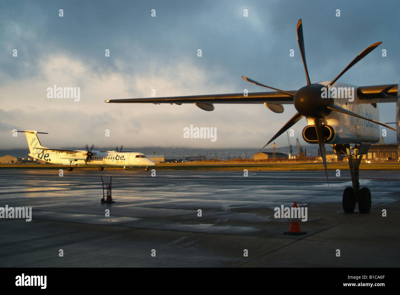 Flybe Dash 8 400 propeller aircraft on apron at Belfast City Airport N ...