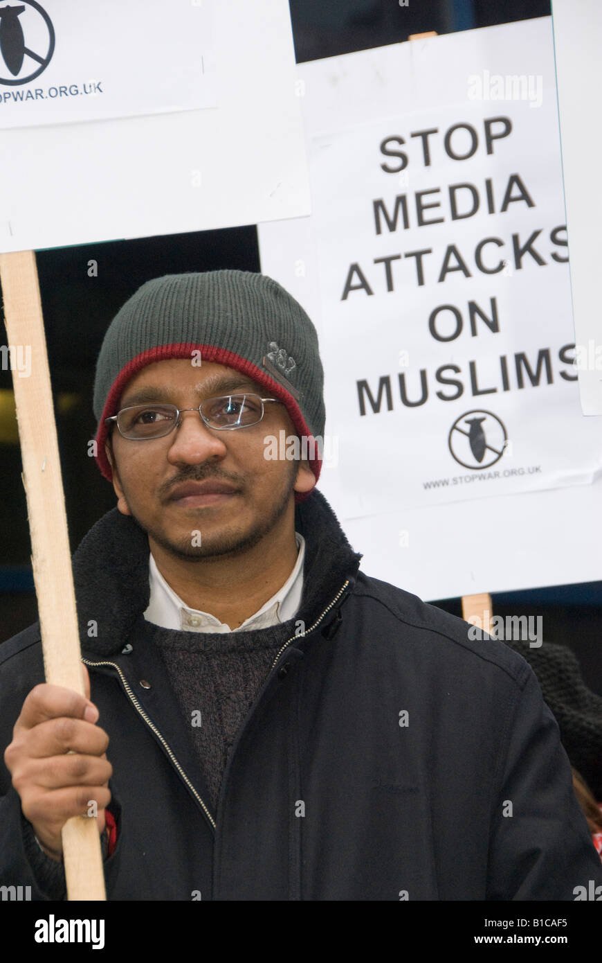 Muslim man with 'Stop Media Attacks on Muslims' placard outside the ...
