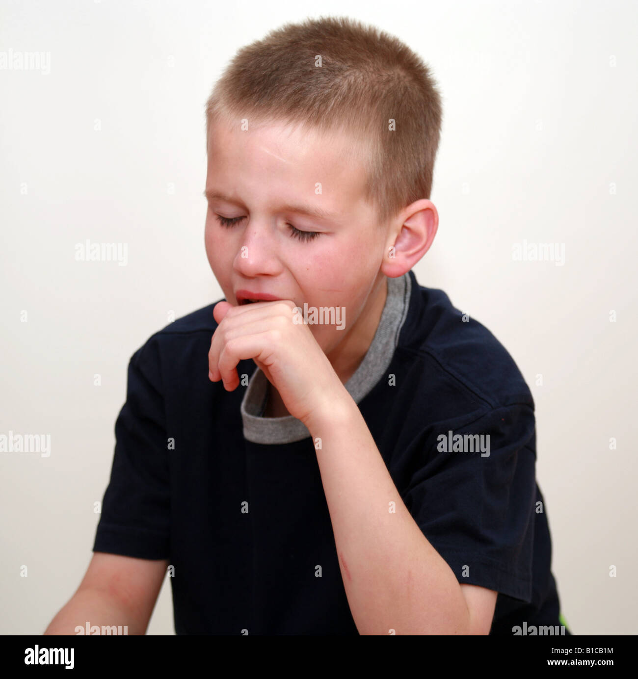 Children hand over mouth hi-res stock photography and images - Alamy