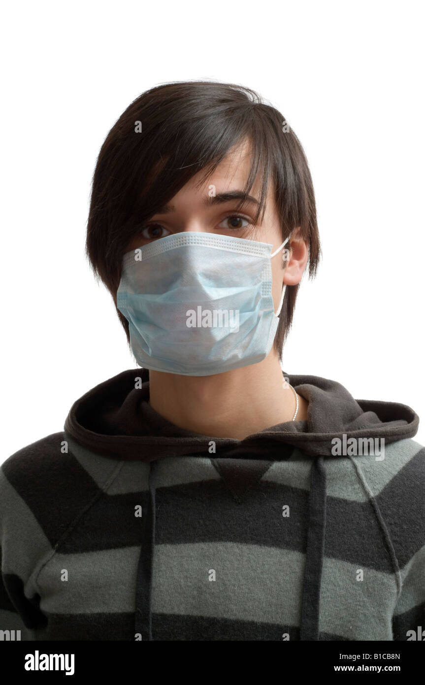 Young man with a medical mask on his face Stock Photo - Alamy