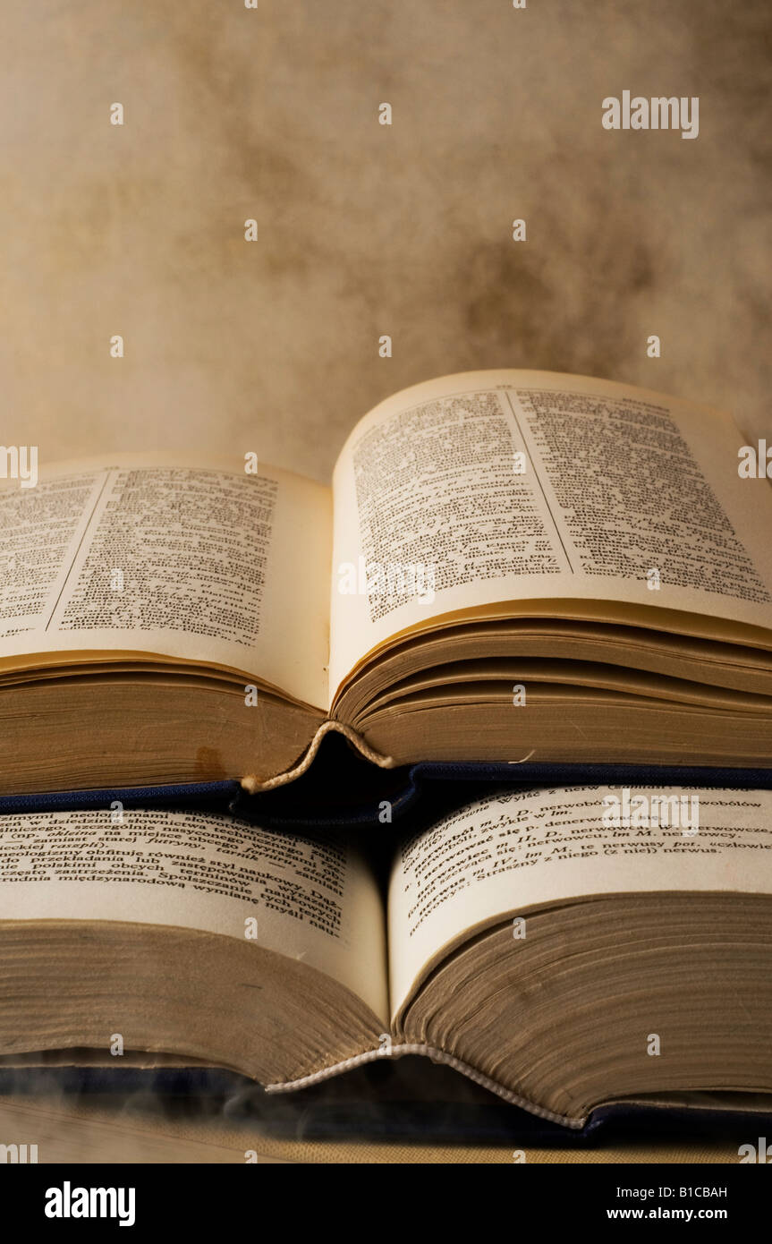 Open old books in sepia Stock Photo - Alamy