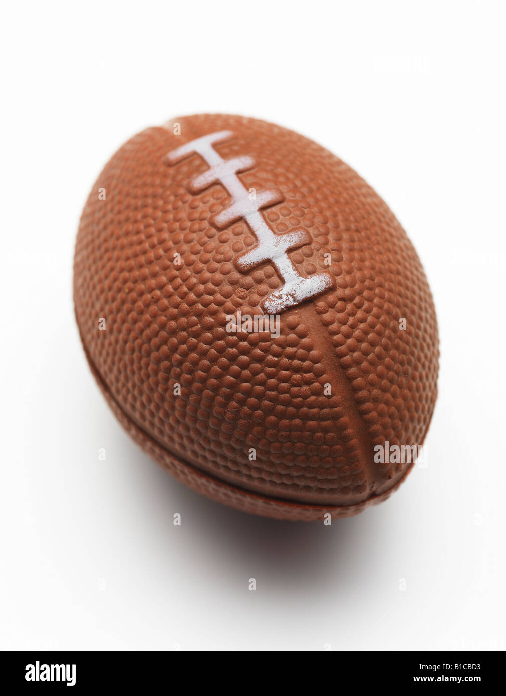 ball football sport oval rough closing seam child Stock Photo - Alamy