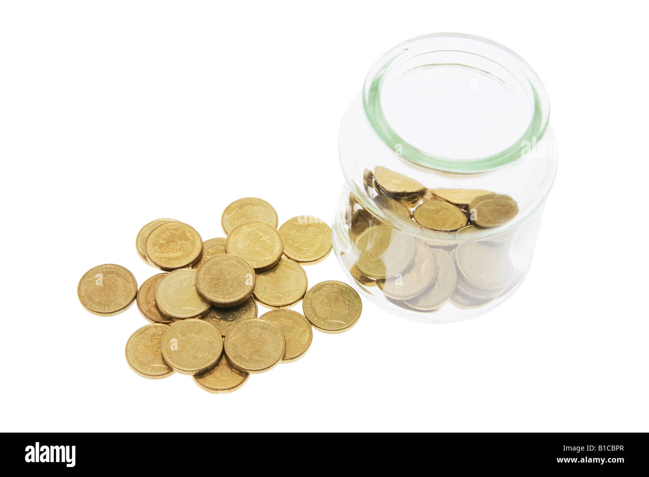 Coins in Glass Jar Stock Photo - Alamy