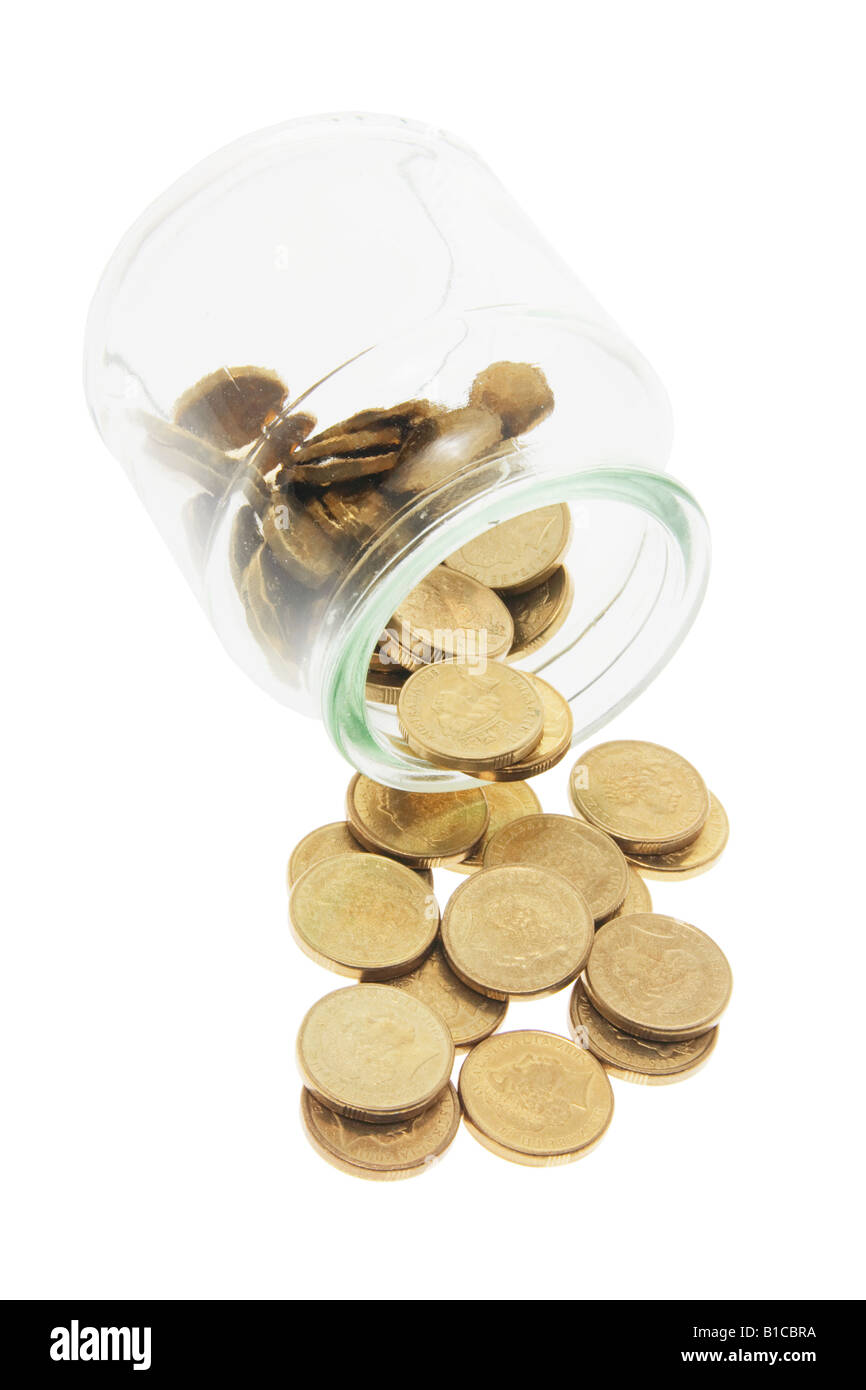 Coins Spilling from Fallen Glass Jar Stock Photo - Alamy