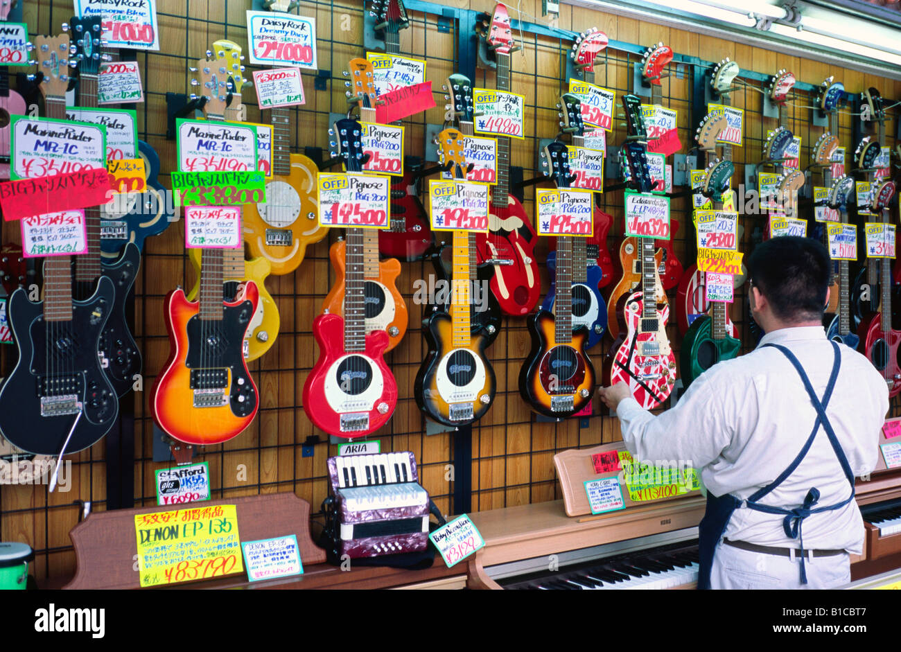 Store in Tokyo's Bunkyo selling musical instruments Stock Photo - Alamy