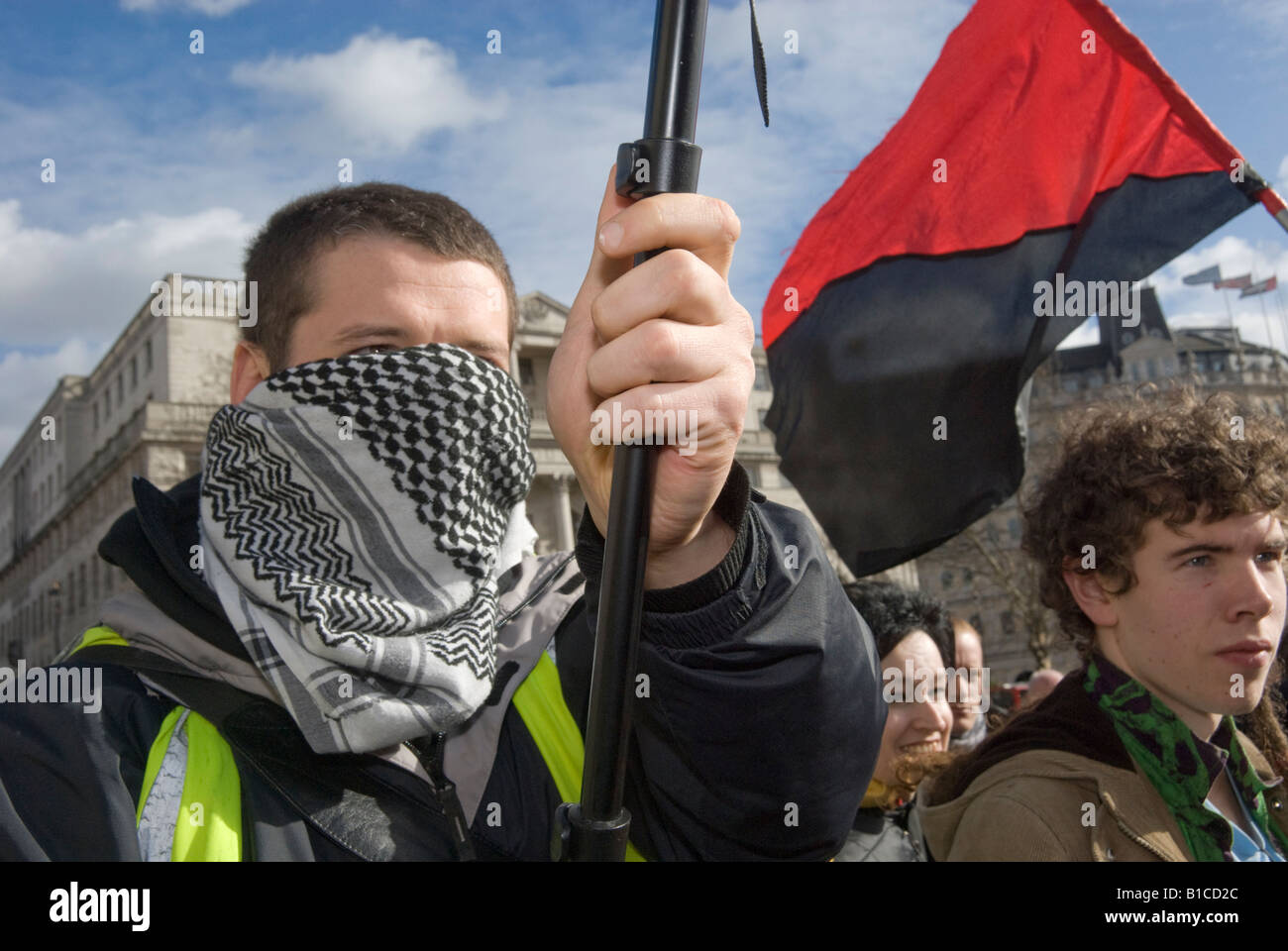 Freedom to protest demonstrators with red and black anarchist flags in ...
