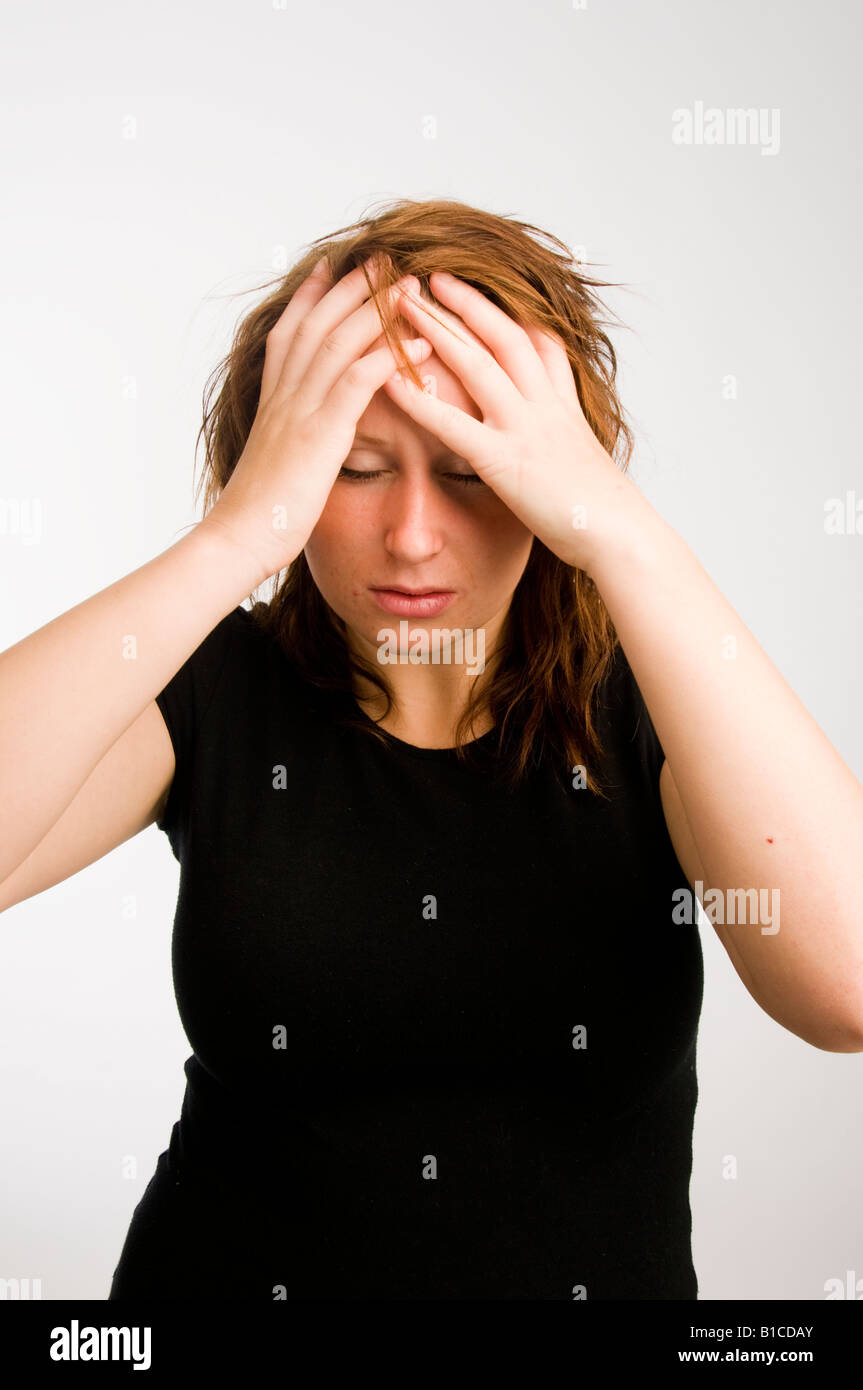 redhead red haired young woman with headache hangover ill sick in pain ...