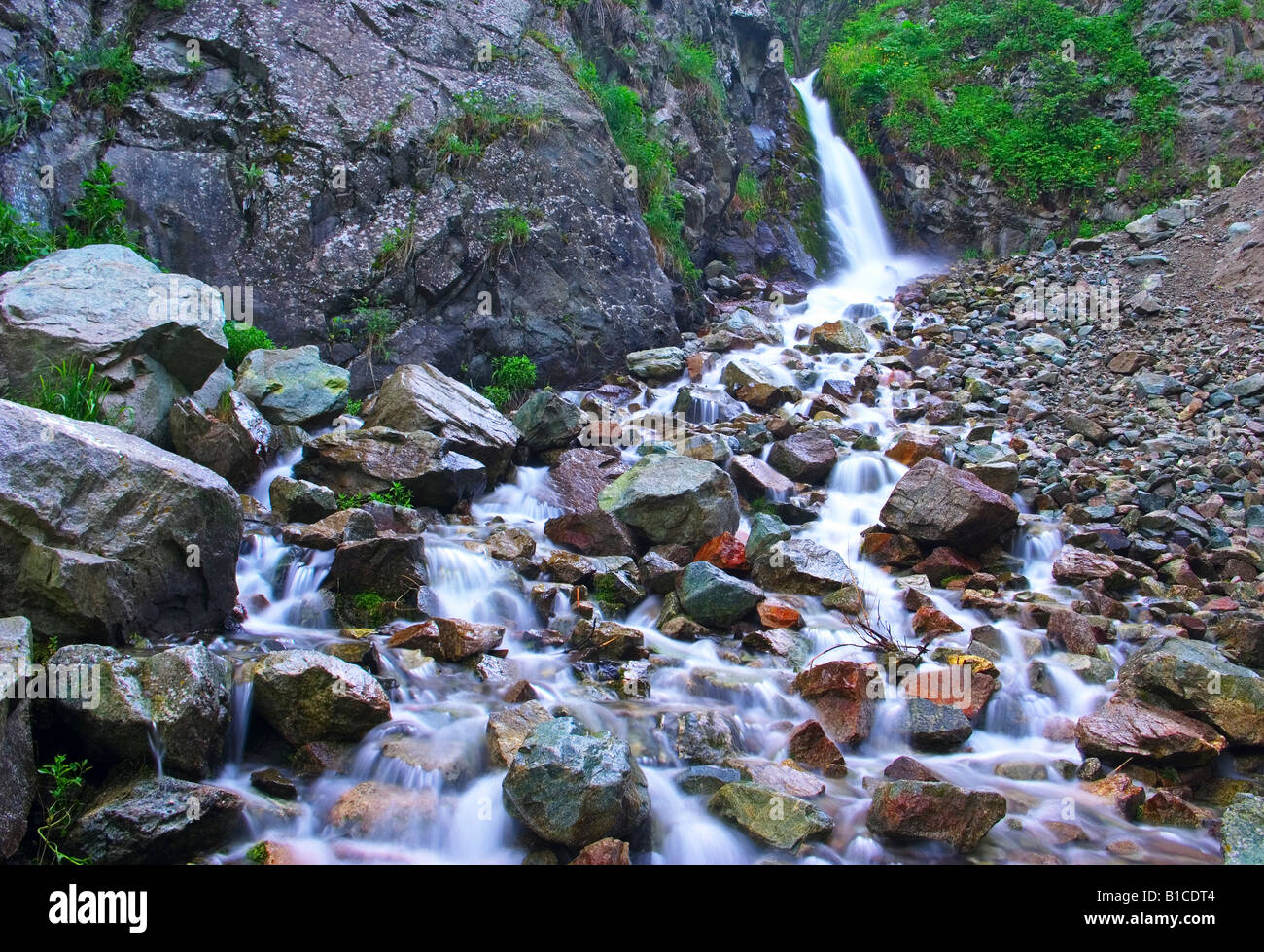 Waterfall and flow of water on stone Stock Photo - Alamy