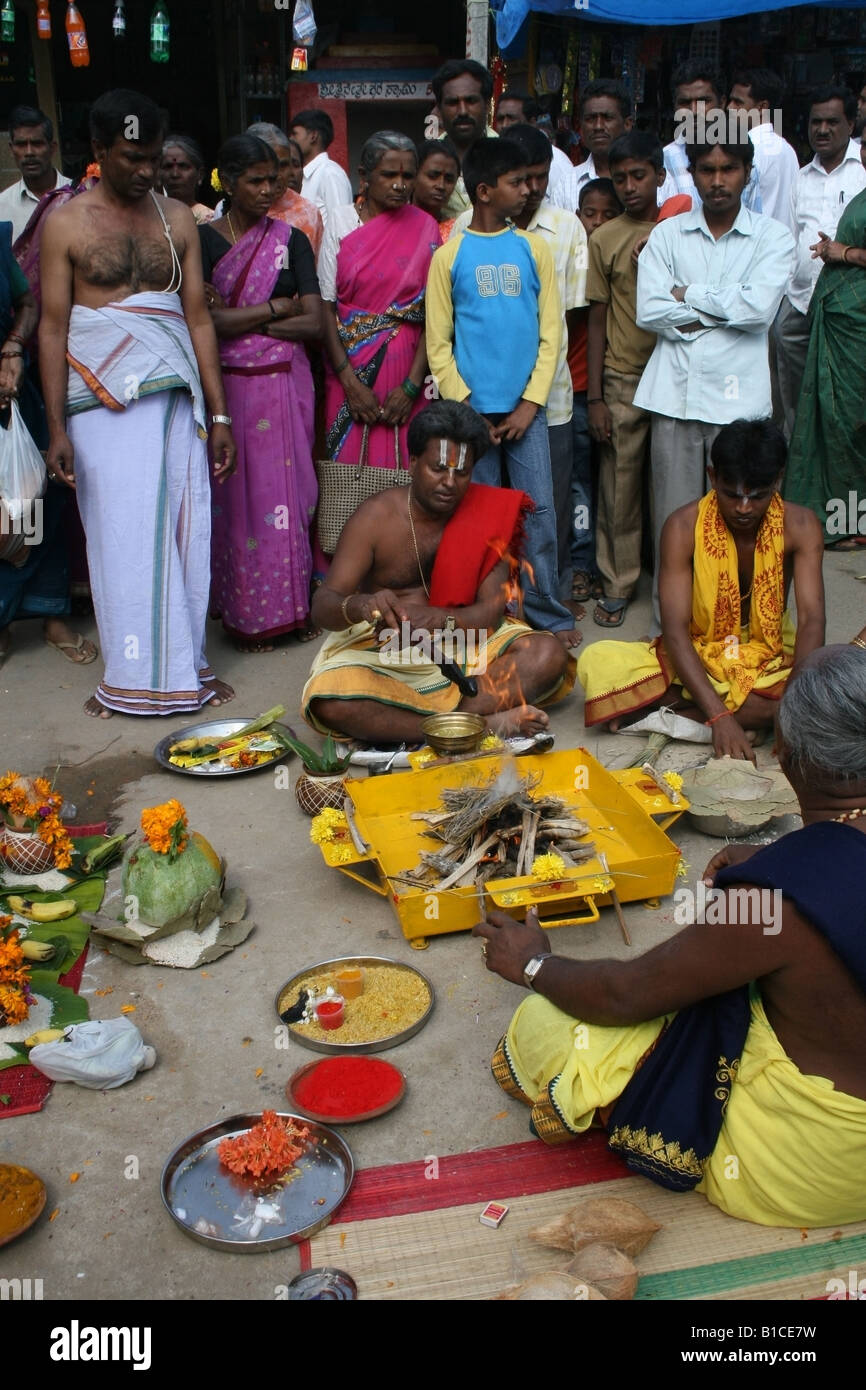 Priests perfoms Havan or arti or fire pooja at the Koti linga temple ...