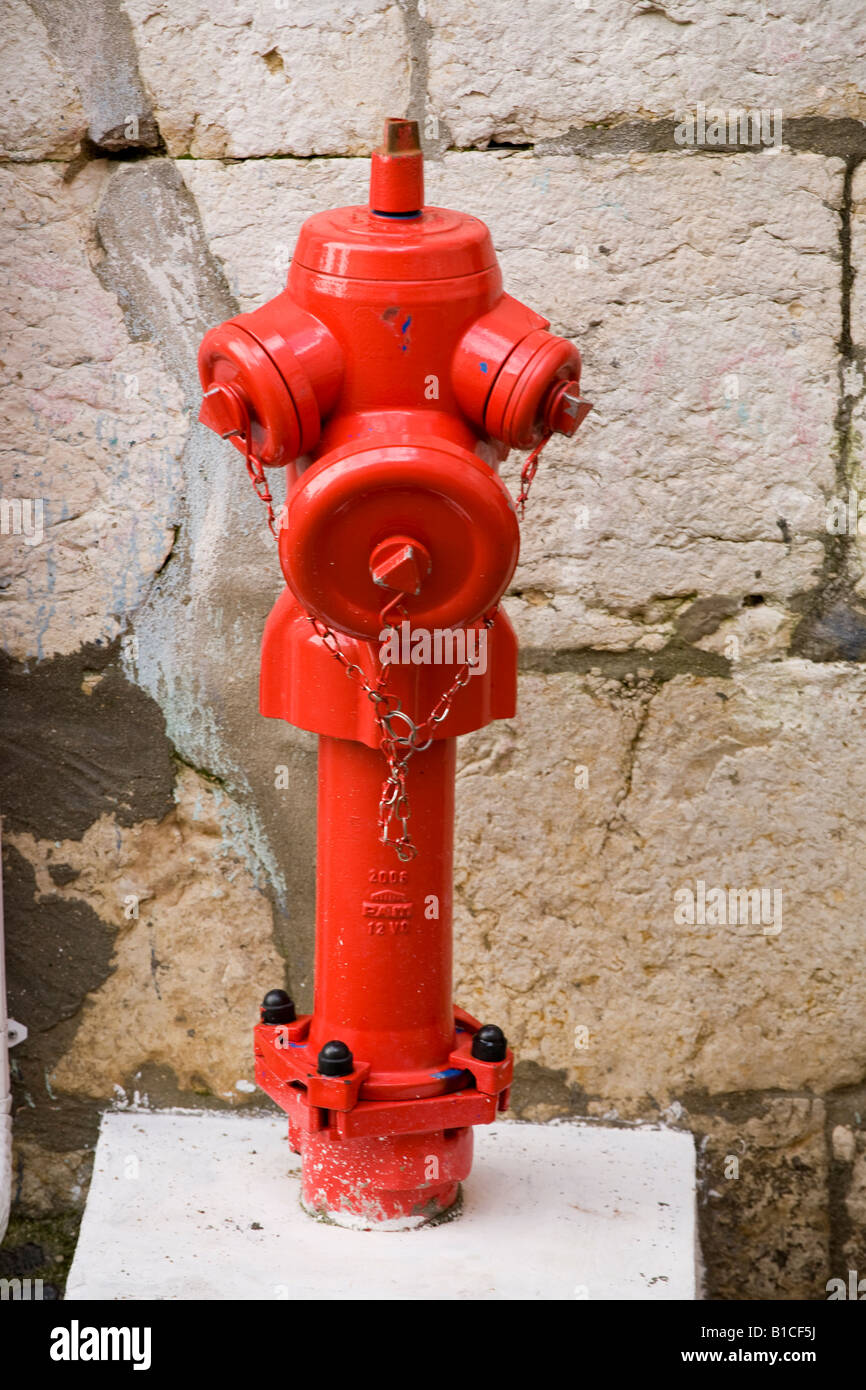 Red fire hydrant in Alfama Lisbon Portugal Stock Photo - Alamy