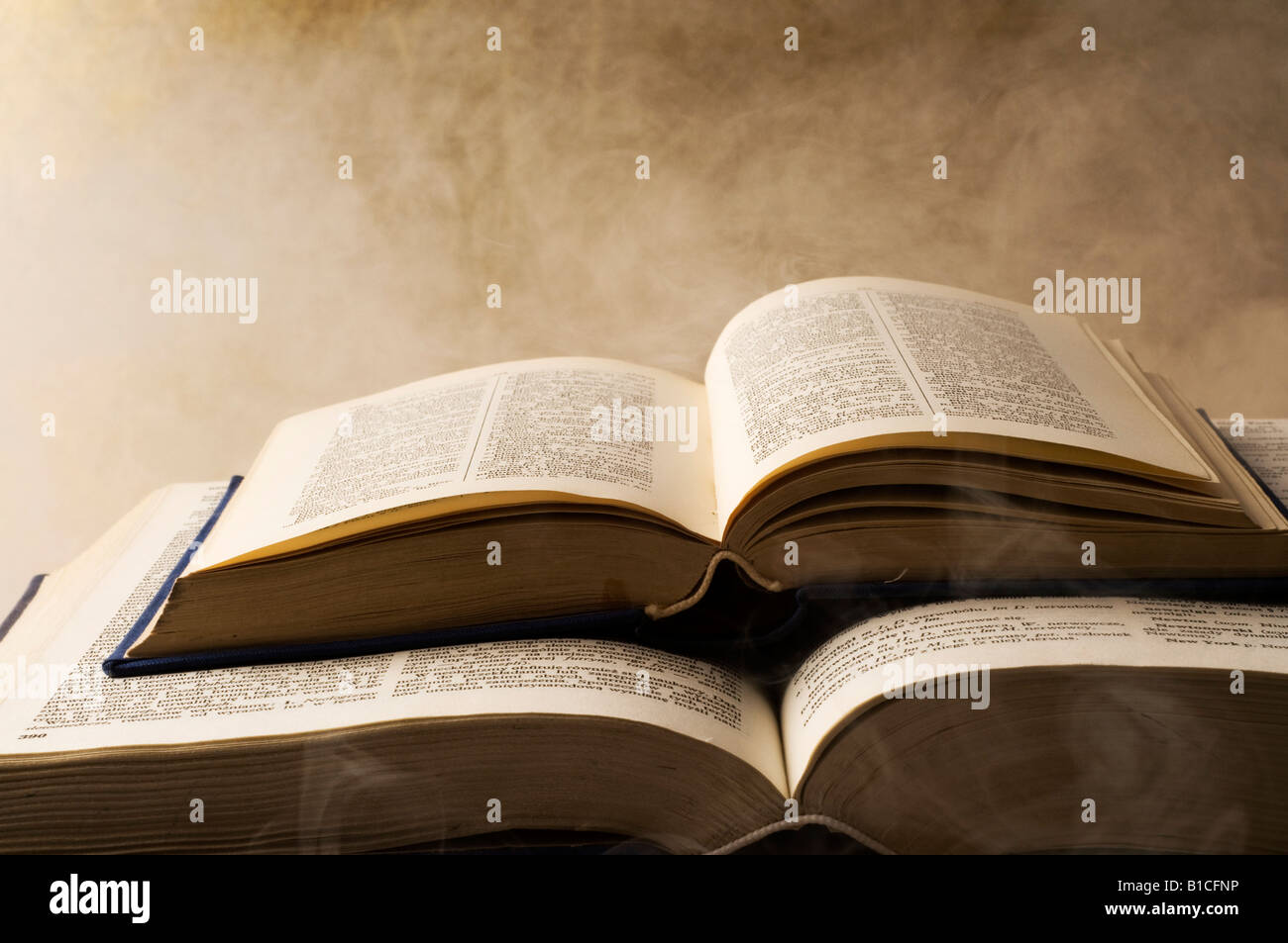 Open old books in sepia Stock Photo - Alamy