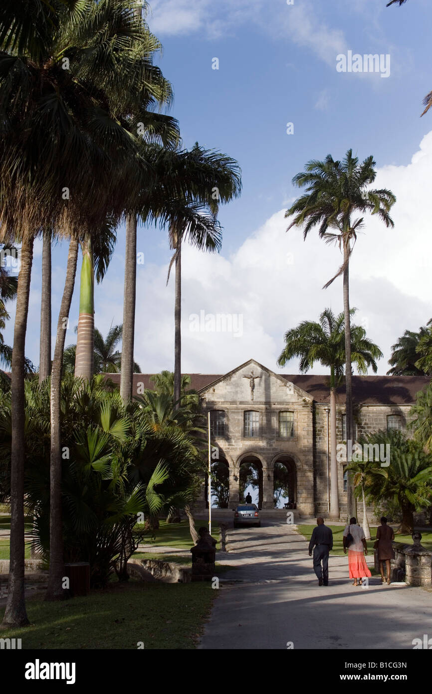 People walking along avenue Codrington College Barbados Caribbean Stock ...