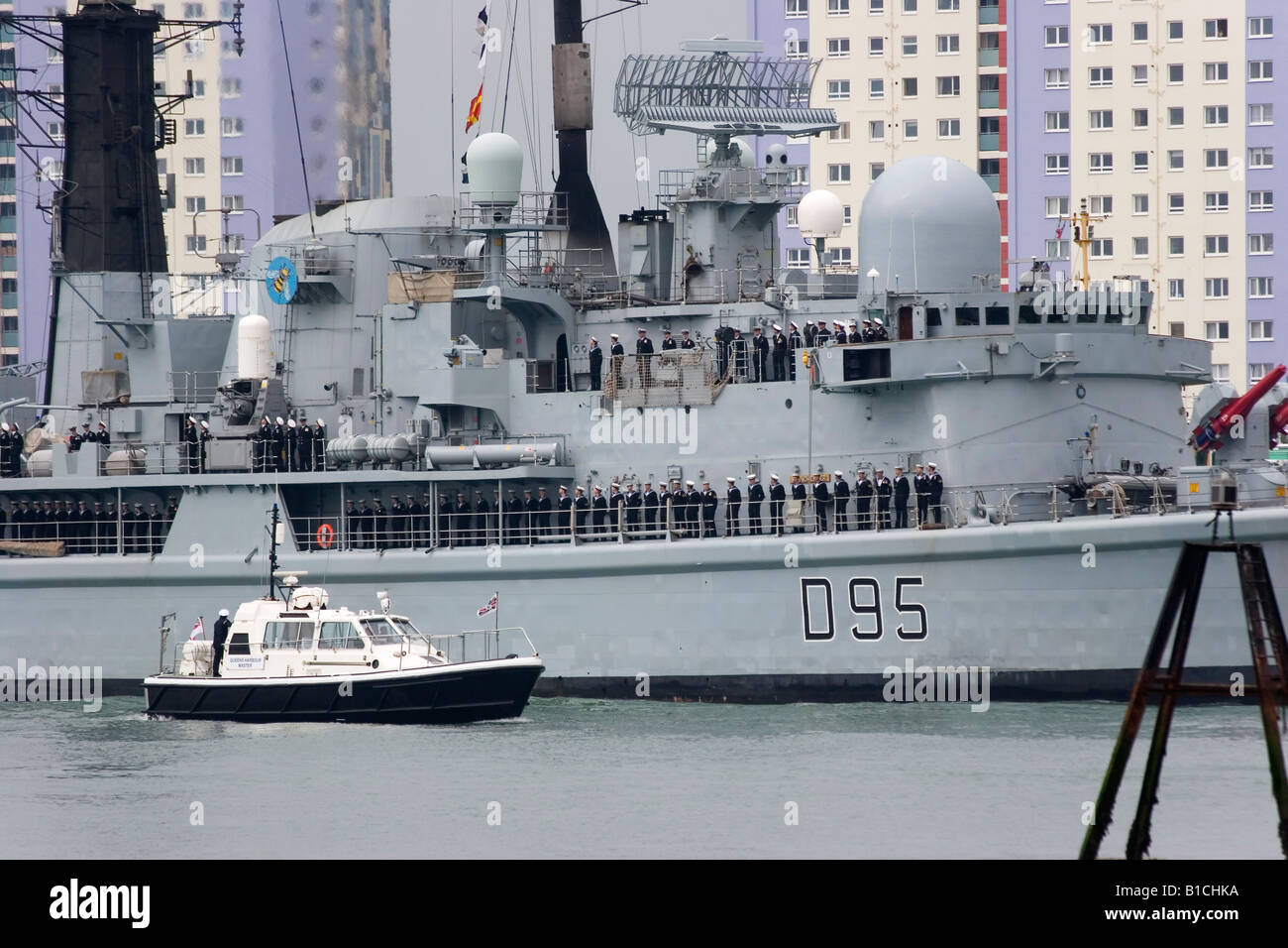 A royal navy ship coming home to port Stock Photo - Alamy