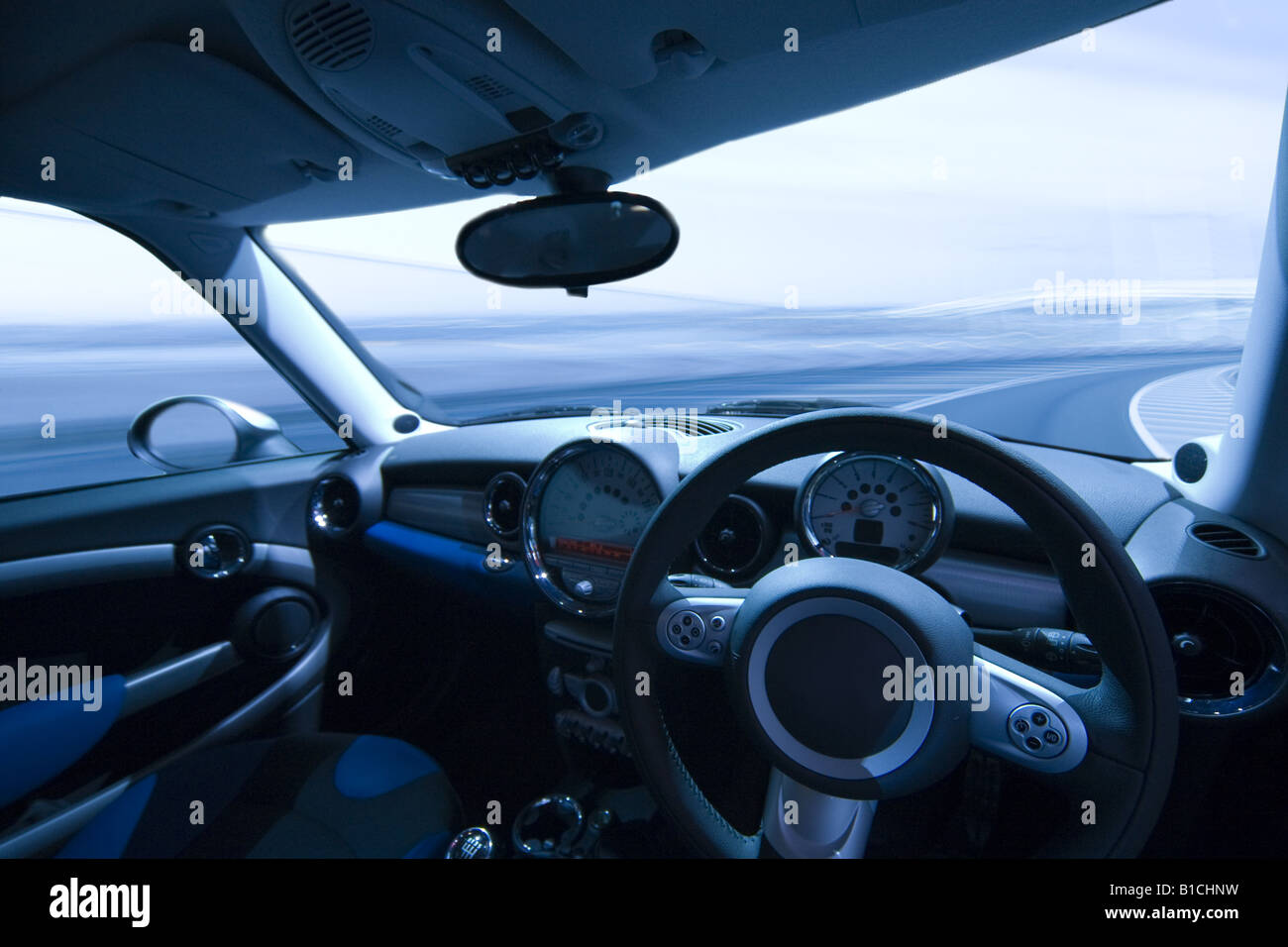 Driving fast Stock Photo - Alamy