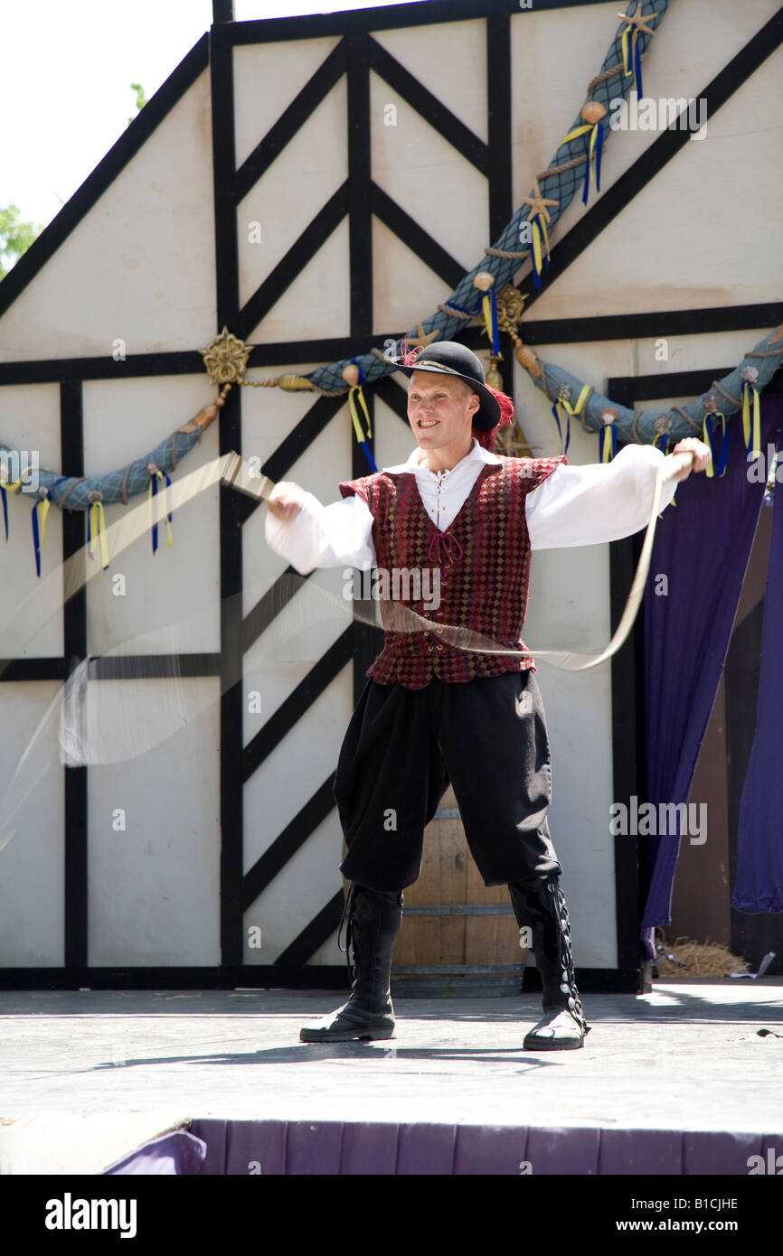 Adam Crack the Whip Master performing on stage Stock Photo - Alamy