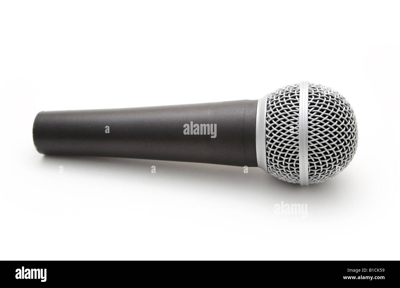 A microphone on a white background Stock Photo - Alamy