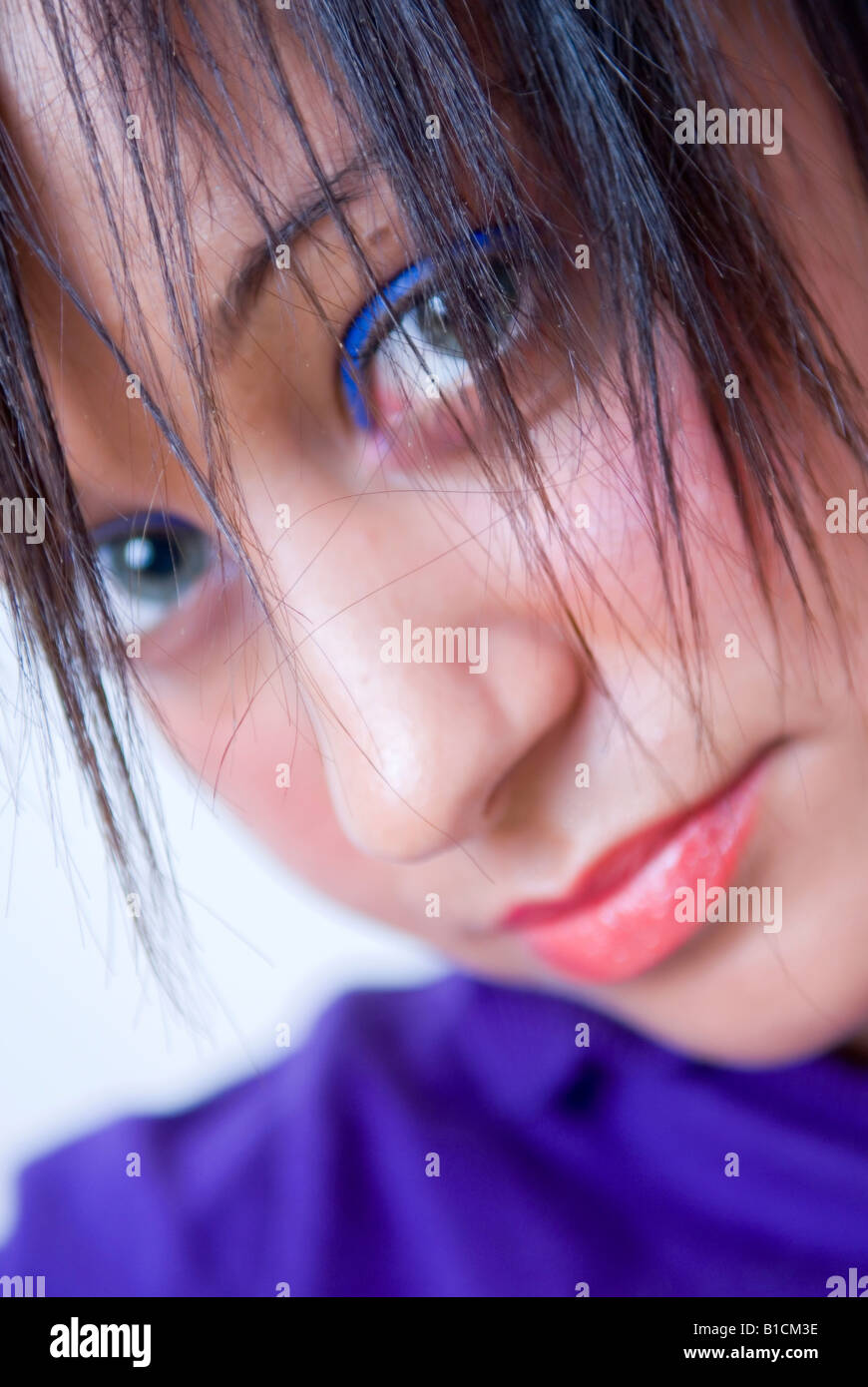 portrait of a heavily rouged young woman with funny hairstyle Stock ...