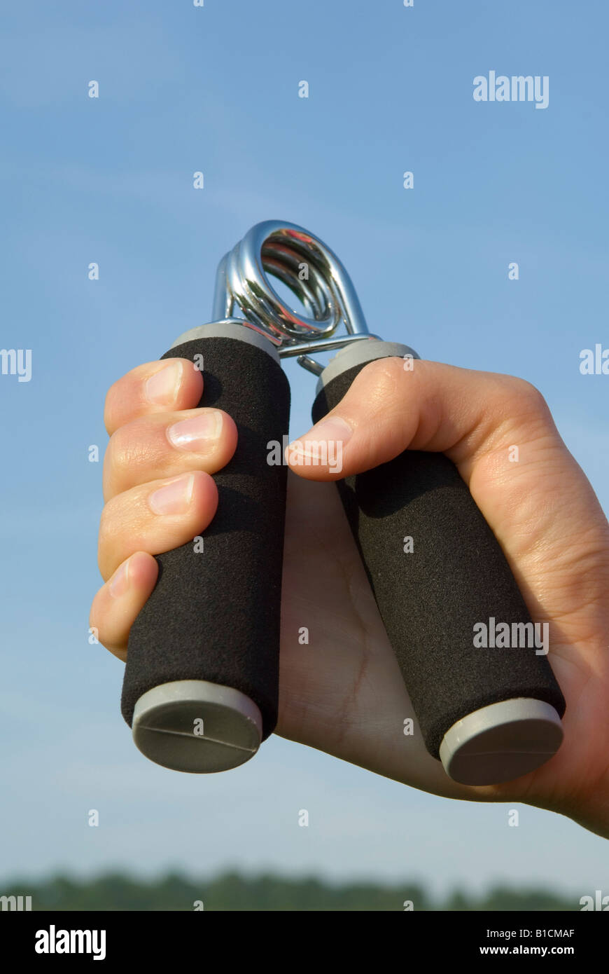 hand with handgrips Stock Photo - Alamy