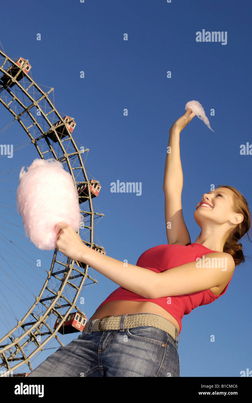 amusement park Prater Vienna, young woman with candy floss, Giant Ferry ...