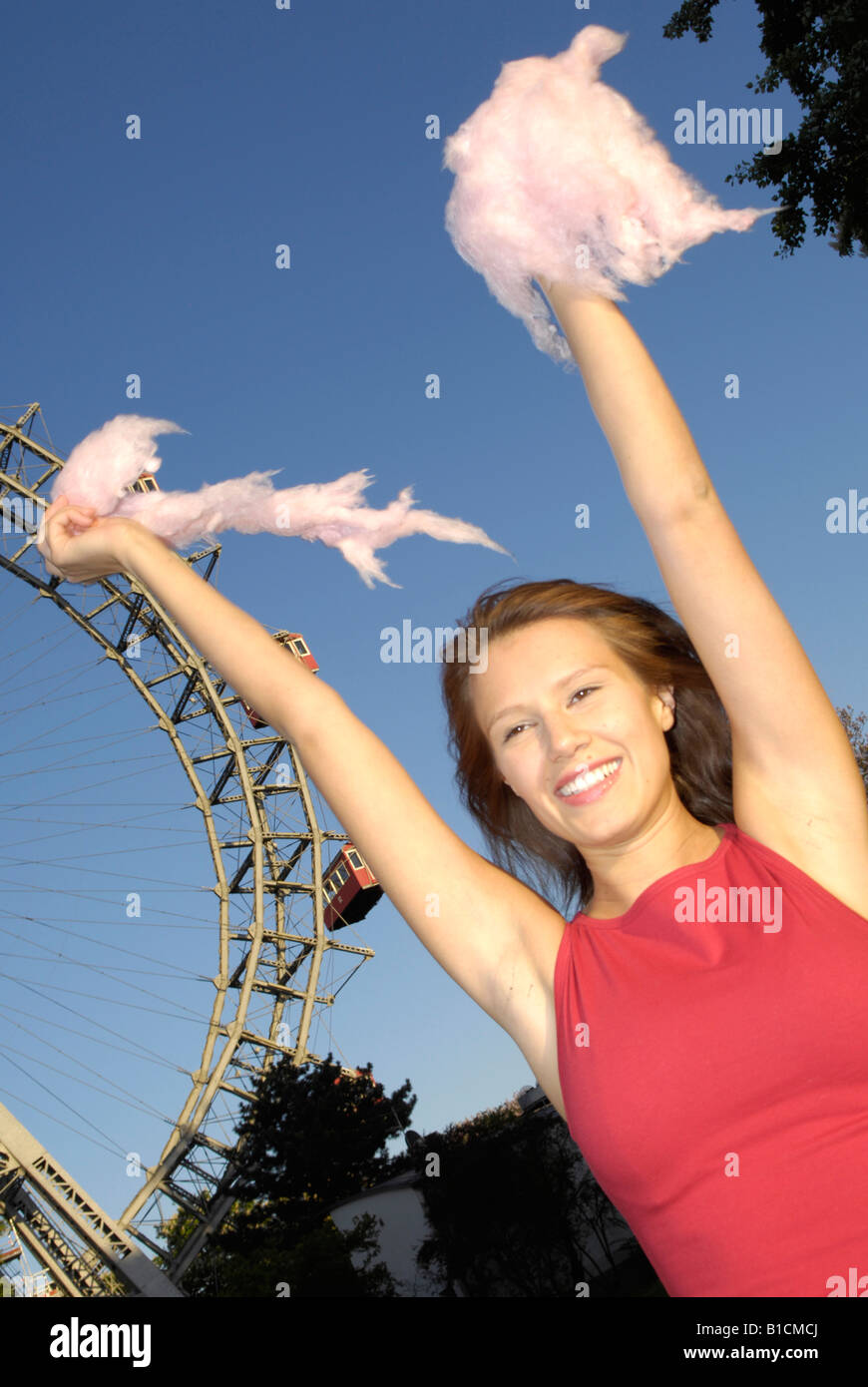 amusement park Prater Vienna, young woman with candy floss, Giant Ferry ...