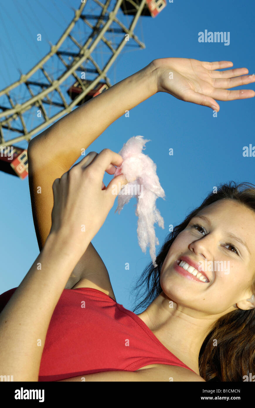 amusement park Prater Vienna, young woman with candy floss, Giant Ferry ...