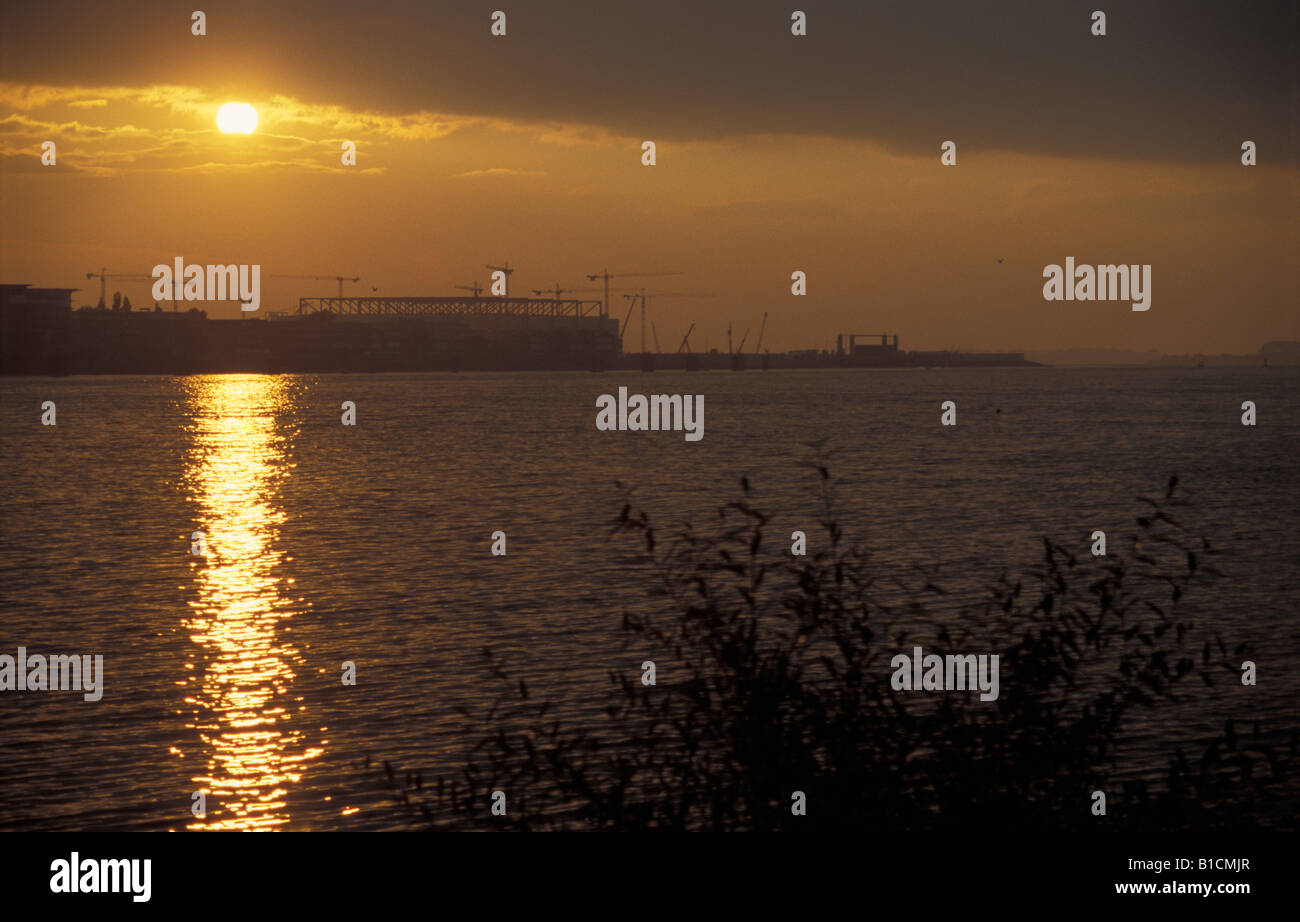 River Elbe with EADS Airbus factory Finkenwerder in Hamburg, Germany ...