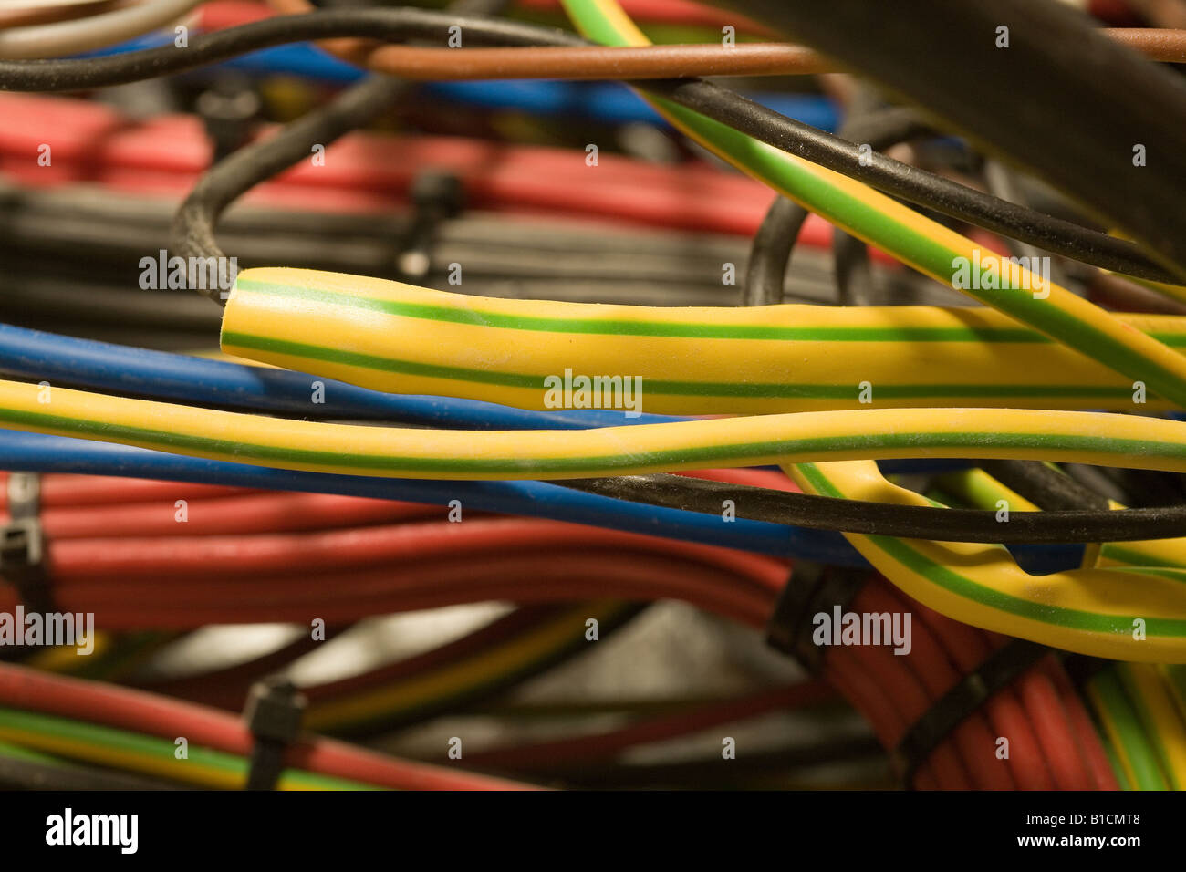 Earth insulation sleeving on some cables entering a complex mains cable ...