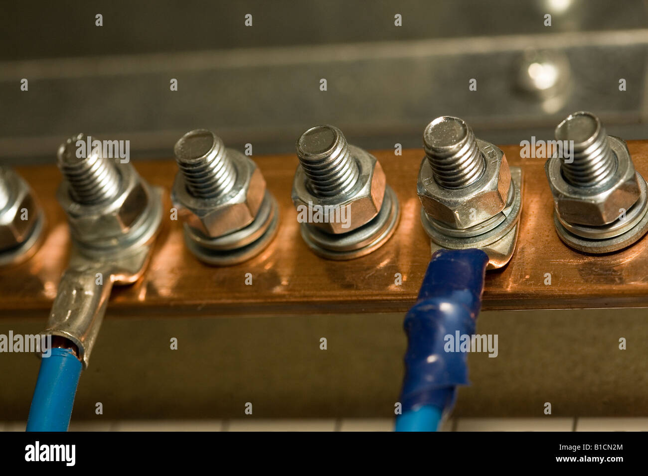 Power cables enter a juction box in a newly constructed London office ...