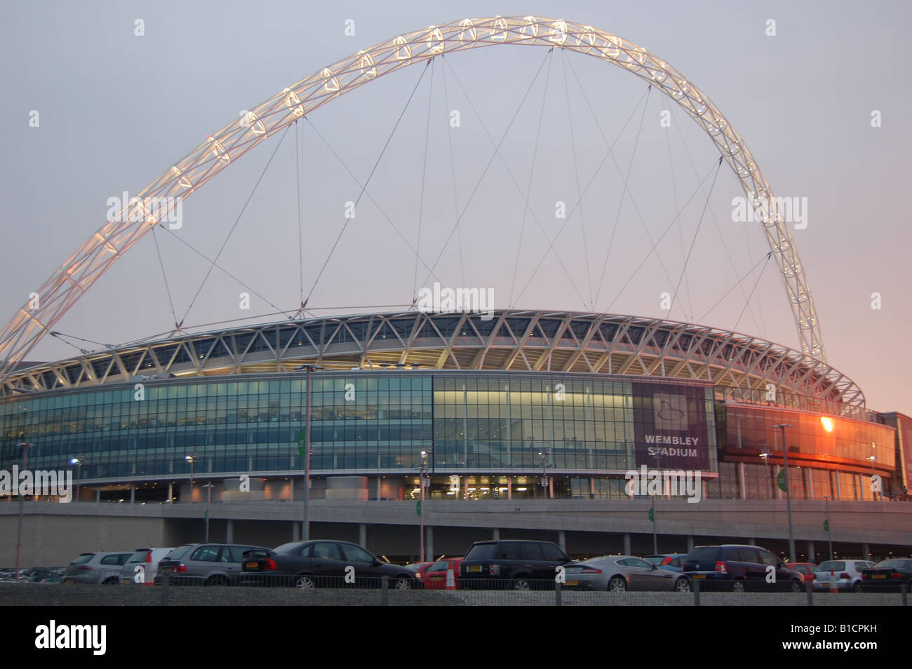 The sun hitting Wembley Stadium at sunset, London, England Stock Photo ...