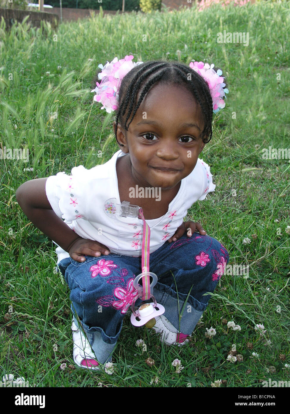 Smiling afro-caribbean girl Stock Photo - Alamy