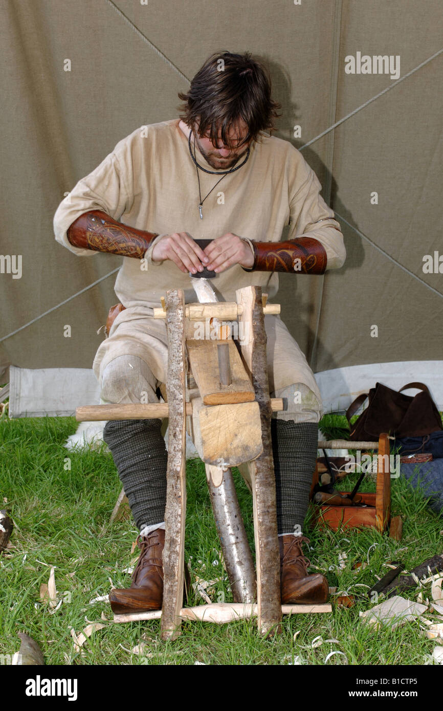Man taking part in a wood working demonstration at a Viking Living ...