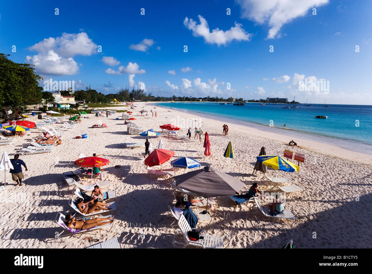 People relaxing at beach Bridgetown Barbados Caribbean Stock Photo - Alamy