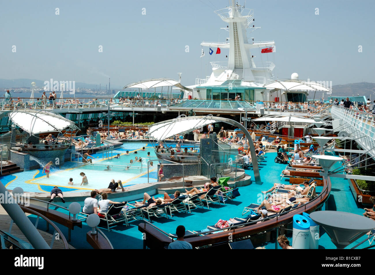 The Main Swimming Pool and Sun Bathing Area aboard the Cruise Liner ...