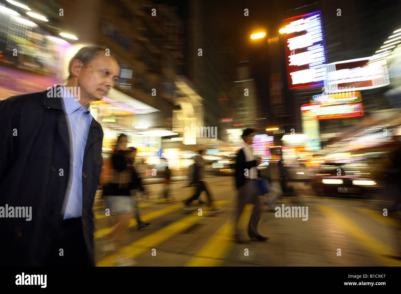 People crossing a street in Kowloon district, Hong Kong, China Stock ...