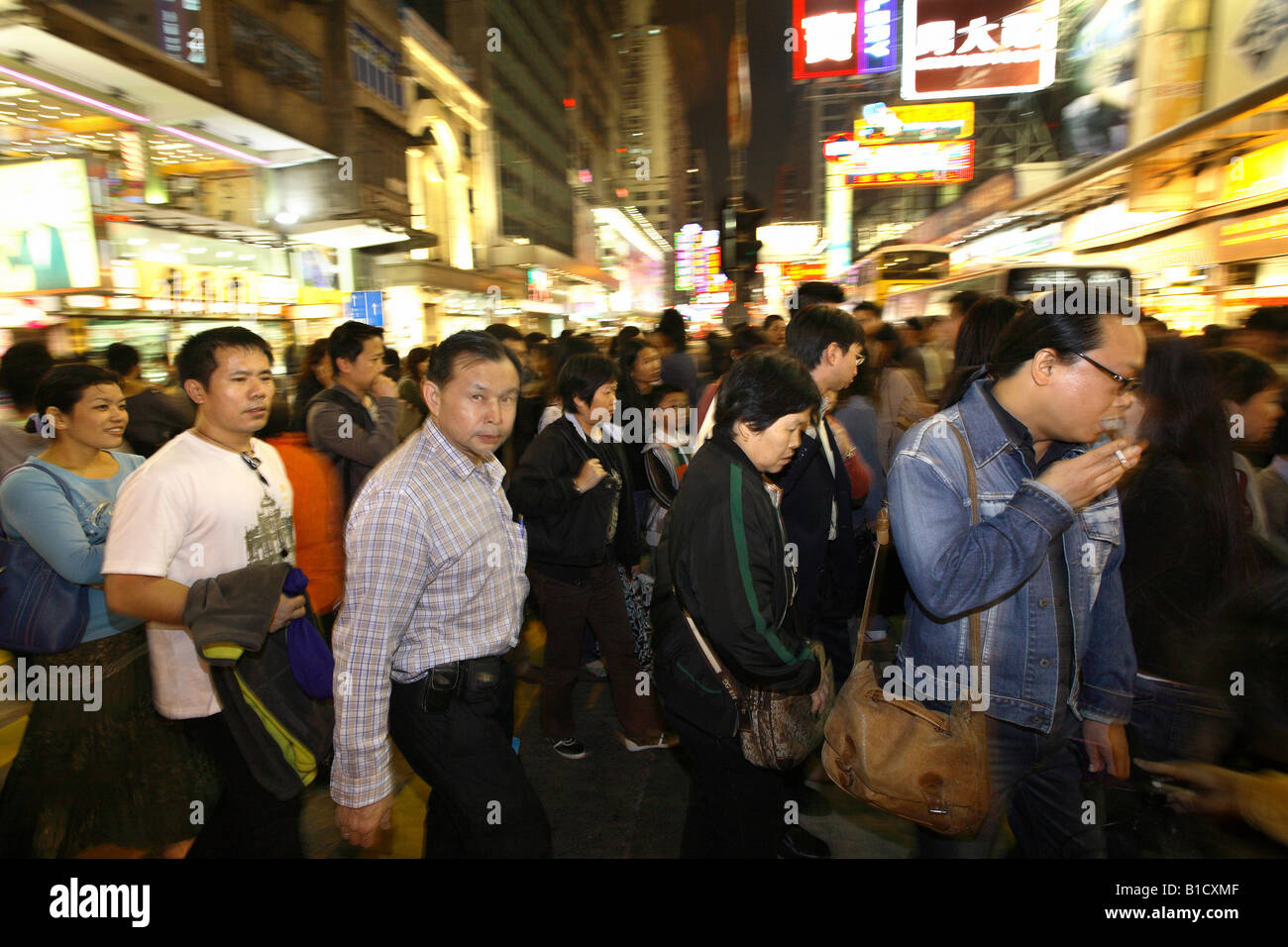 People crossing a street in Kowloon district, Hong Kong, China Stock ...