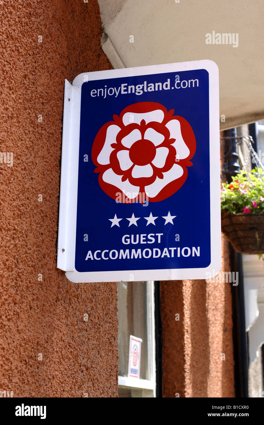 A coveted four star English Rose guest accommodation sign Stock Photo ...