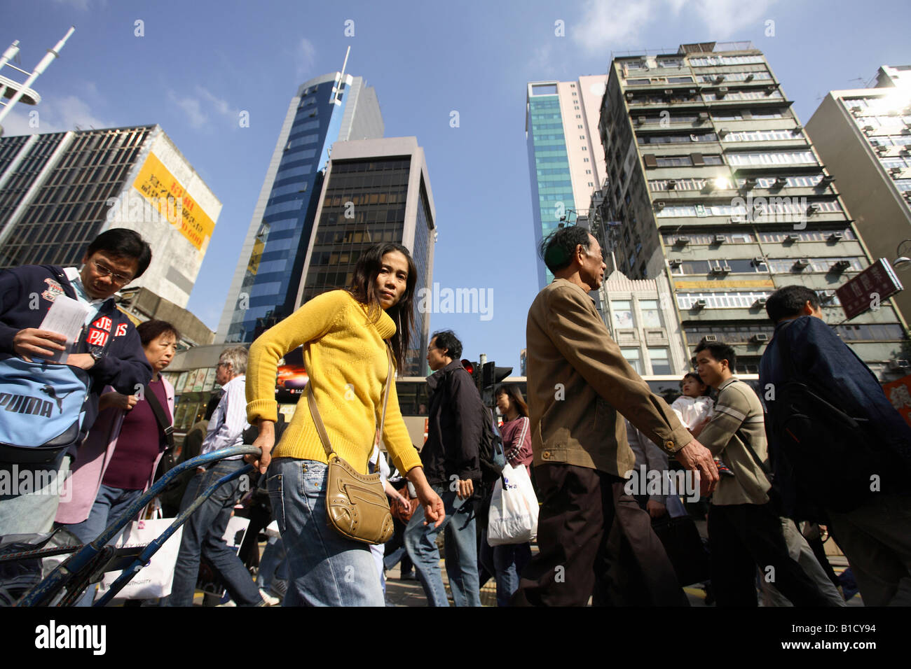 People crossing a street in Kowloon district, Hong Kong, China Stock ...